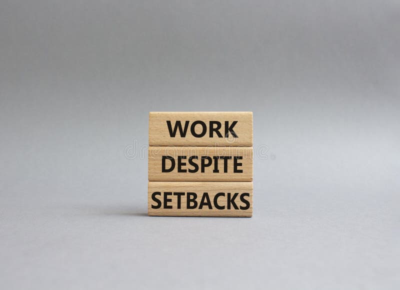 Work Despite Setbacks Symbol. Wooden Blocks with Words Work Despite ...