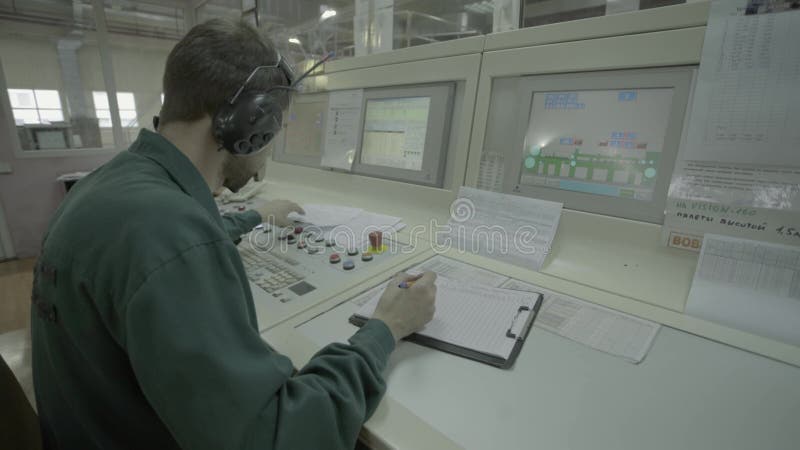 The Work of the Man Dispatcher in the Control Room at the Factory ...