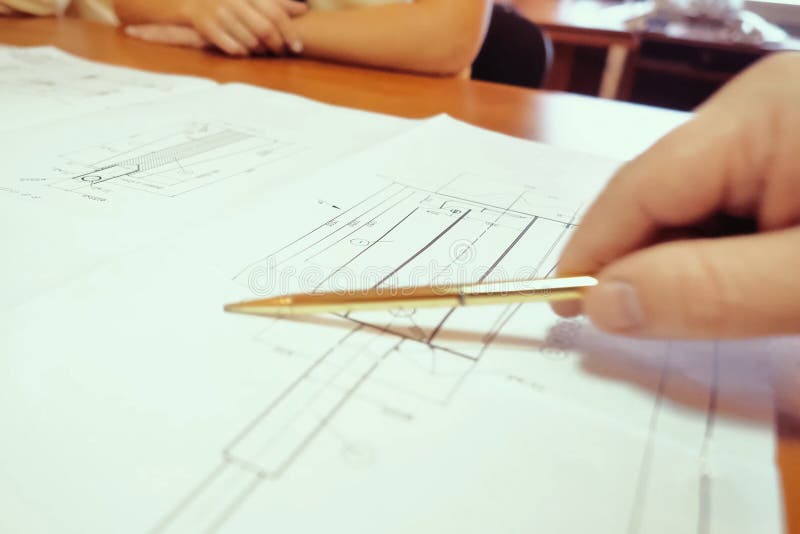 Work on a Drawing of Diagram by an Engineer. Engineer S Hand Over the ...