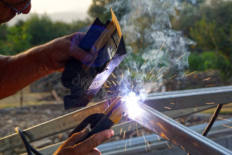 Work with Electric Welding stock image. Image of knit - 39170667