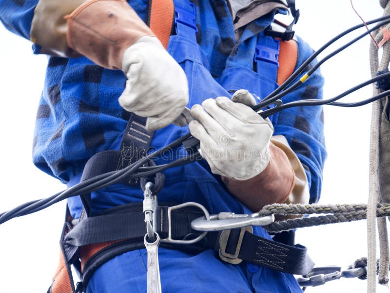 Work of an Electrical Installation Fitter on a Power Pole Stock Photo ...