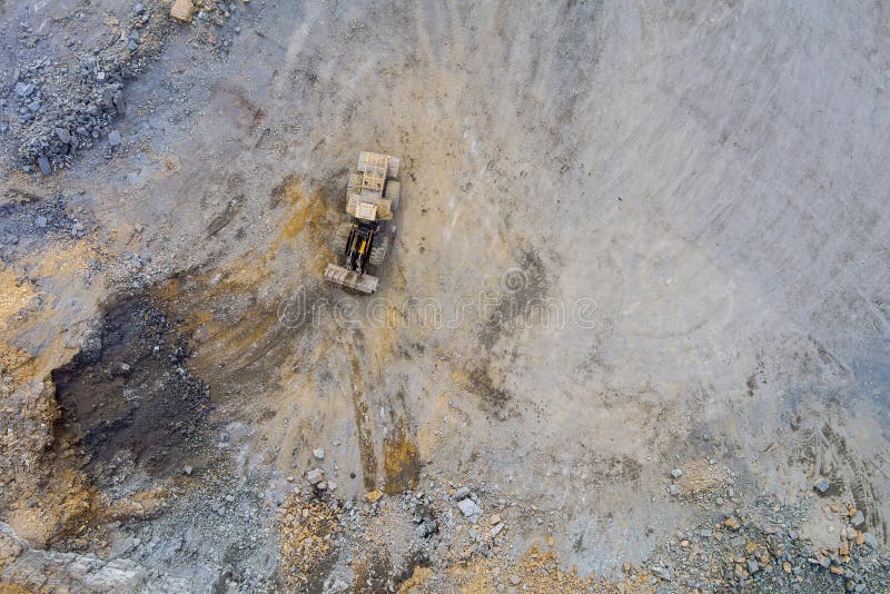Work the Excavator in an Open Pit the Inside a Granite Quarry Stock ...