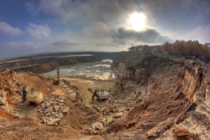 Work of Excavators on Limestone Mining in a Quarry Stock Image - Image ...