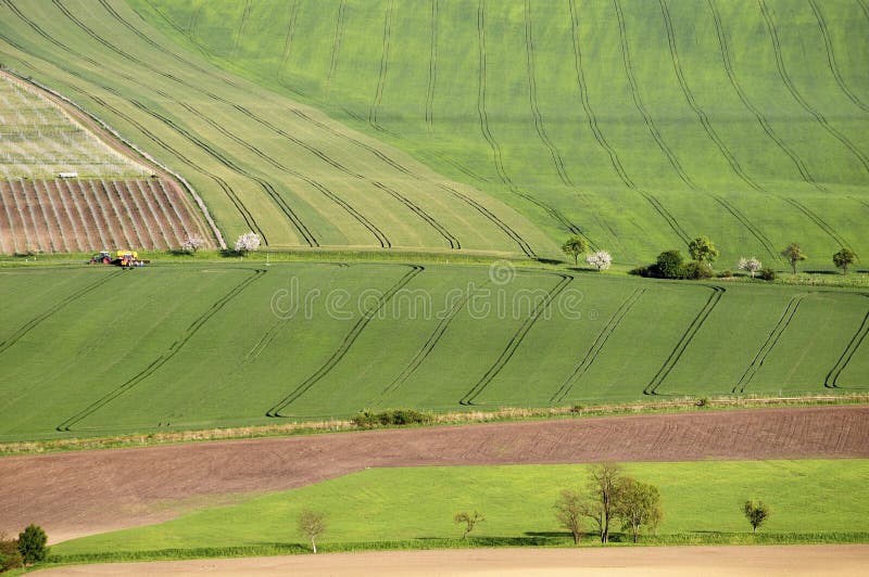 Work in the Field in Spring Stock Photo - Image of machinery, ground ...