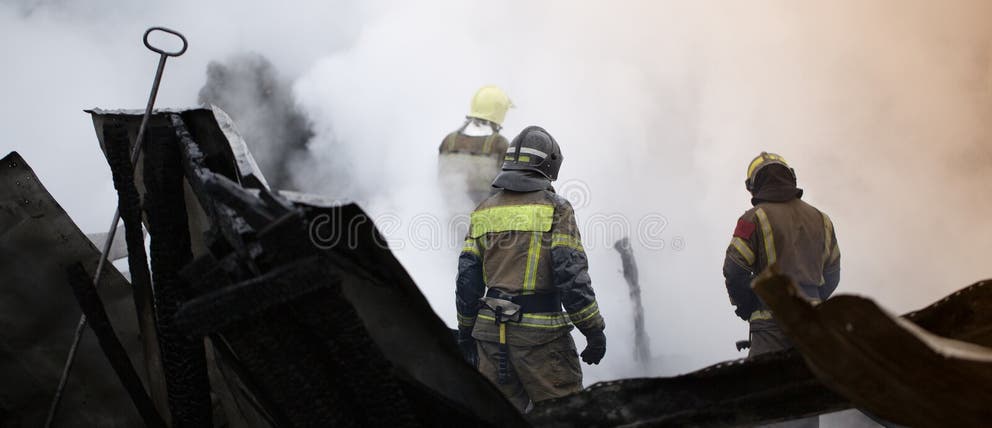 The Work of Firefighters on Fire. Fighting Fire in Case of a Building ...