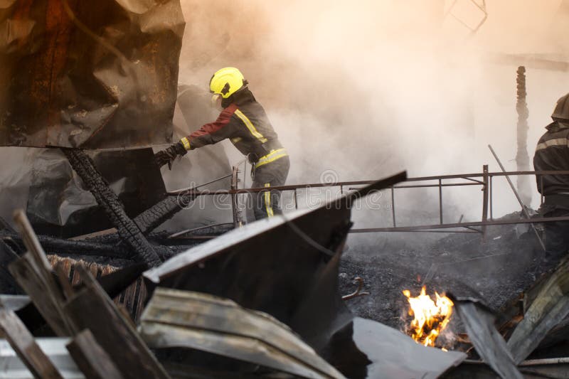 The Work of Firefighters on Fire. Fighting Fire in Case of a Building ...