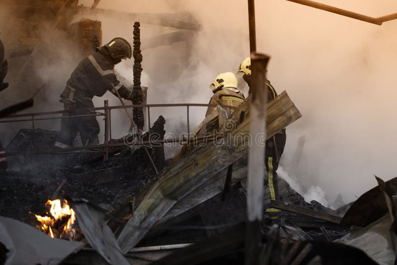 The Work of Firefighters on Fire. Fighting Fire in Case of a Building ...