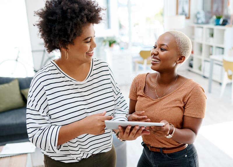 The Work Flows Faster with Modern Tech. Two Businesswomen Working ...