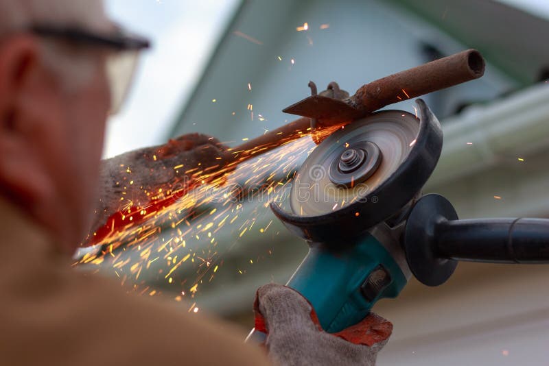 Work with a Grinding Machine with Sparks Stock Photo - Image of ...