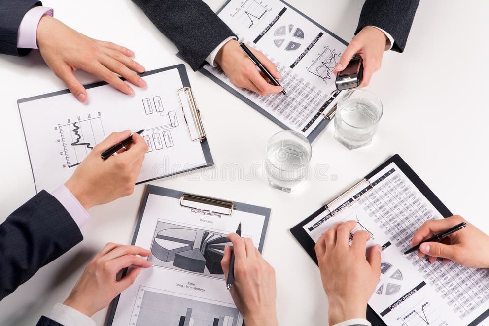 Work in group stock image. Image of meeting, holding, briefing - 9344953