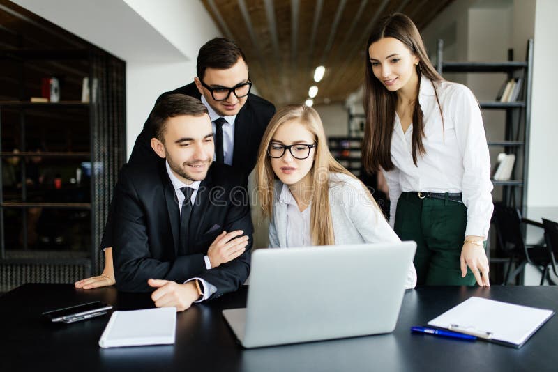 Work Group Get Around Laptop and Watching. Stock Photo - Image of desk ...