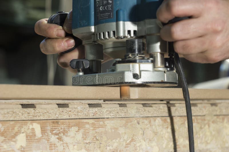 Router Blade Cutting Rebate in Strip of Wood Stock Photo - Image of ...