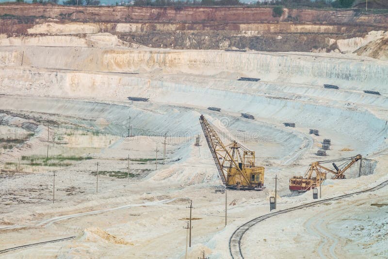 Work of Heavy Grab Excavators in the Chalk Quarry. Heavy Mining ...