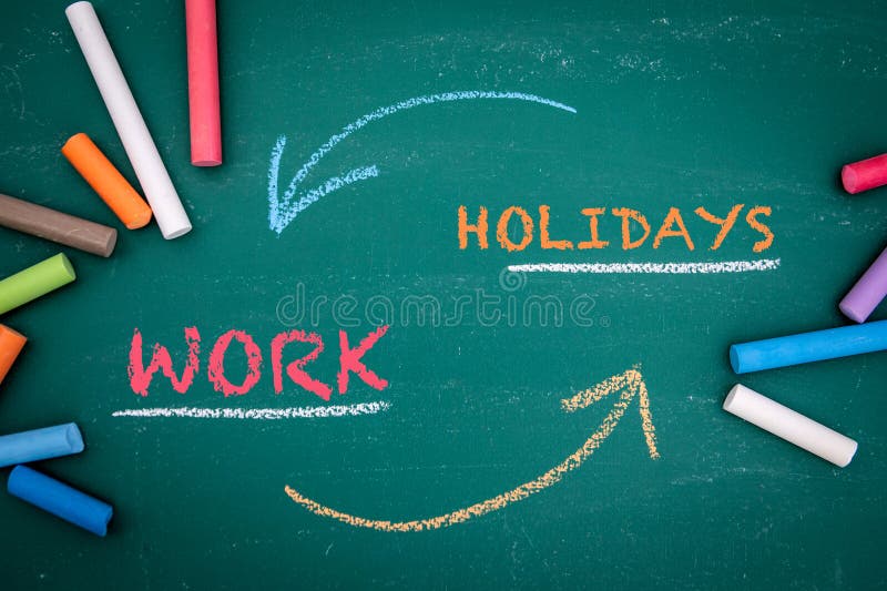 WORK HOLIDAYS Concept. Colored Pieces of Chalk and Text on a Green ...