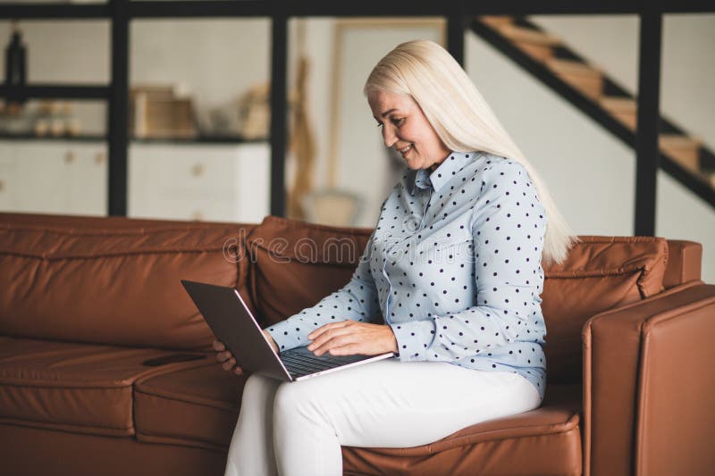 Blonde Woman Working on the Laptop Stock Image - Image of blonde, home ...