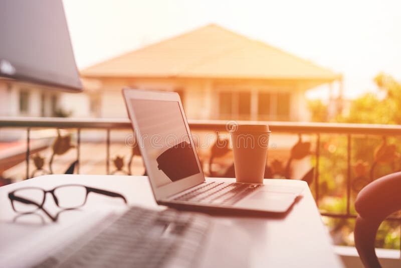 Working Table at Home with Computer Monitor and Laptop Computer Stock ...