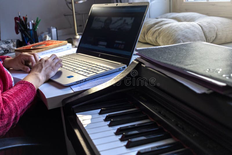 Work at Home. Girl Using a Laptop during Her Workday Stock Photo ...