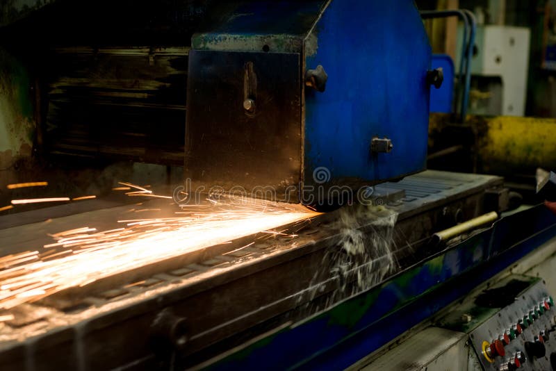 Work of an Industrial Surface Grinding Machine. Grinding of a Flat ...