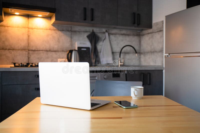 Work on the Kitchen Office. Remote Work from Home Office Stock Photo ...