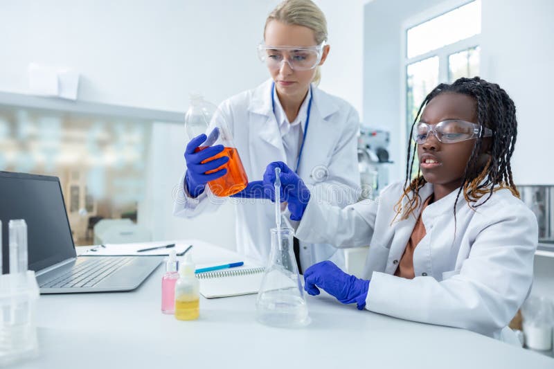 Two People Working with the Vacutainers in a School Laboratory Stock ...
