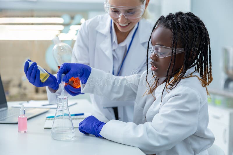 Two People Working with the Vacutainers in a School Laboratory Stock ...