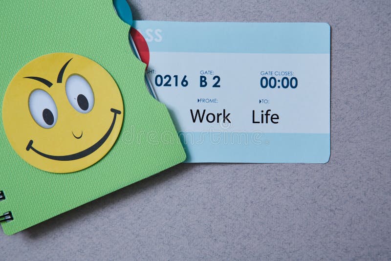 Work Life Balance Choice Concept. Boarding Pass and a Notebook on a ...