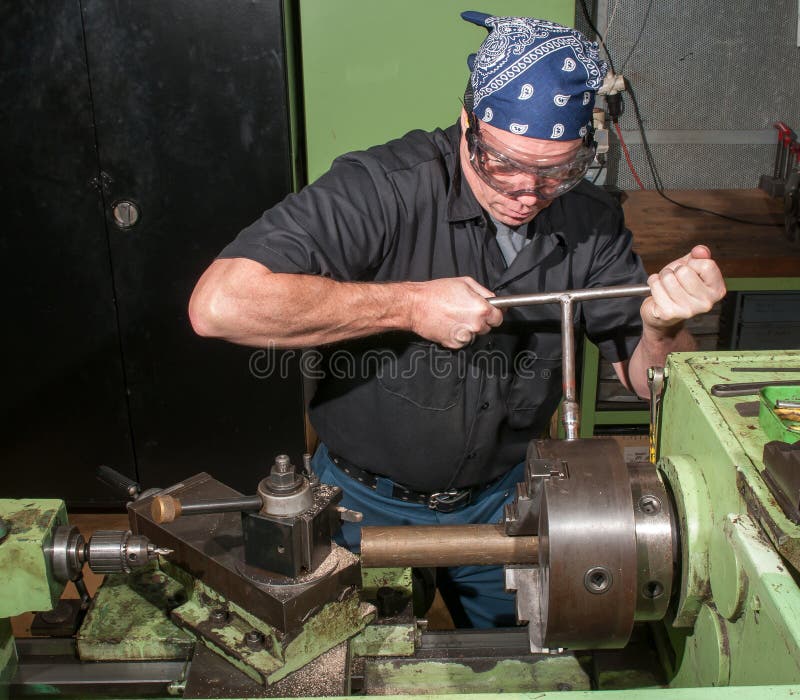 Hard at Work in a Machine Shop. Stock Photo - Image of machine, drill ...