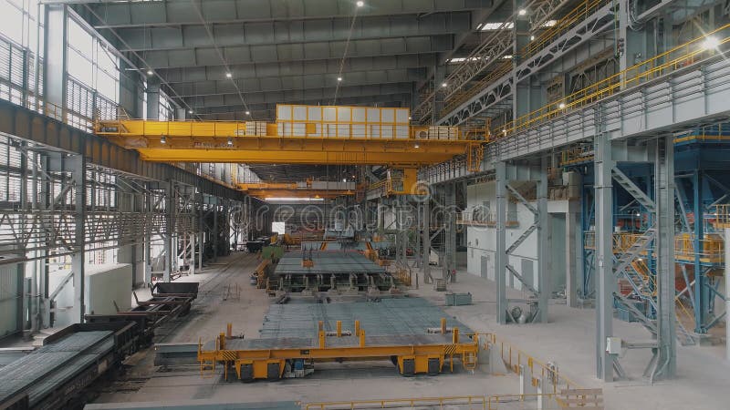 Yellow Overhead Crane in a Modern Factory. the Work of an Overhead ...