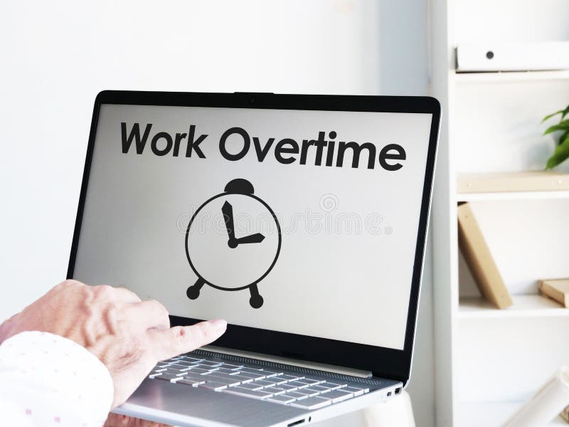 Work Overtime is Shown on the Business Photo Using the Text Stock Photo ...
