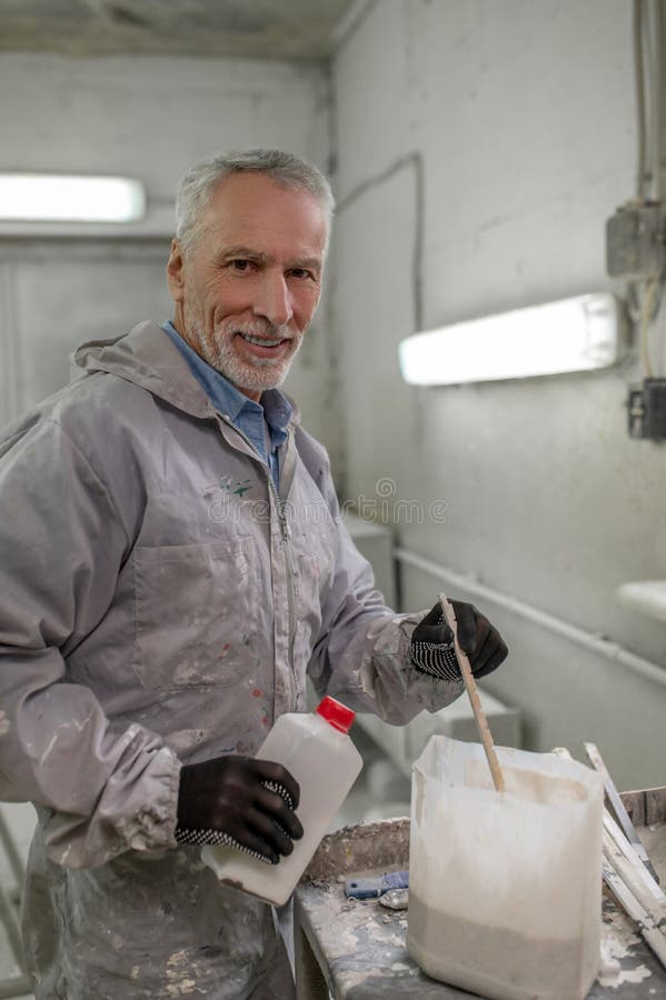 Painter Preparing Paint for Painting Wood in a Workshop Stock Image ...