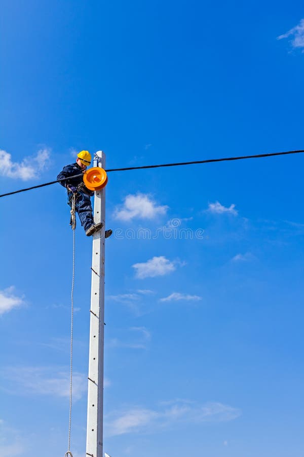 Work on a pole stock image. Image of occupation, overhead - 51928089