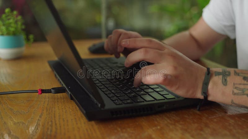 Tattooed Hands Type On Laptop Keyboard Coding Session By Developer Work Process In Tech