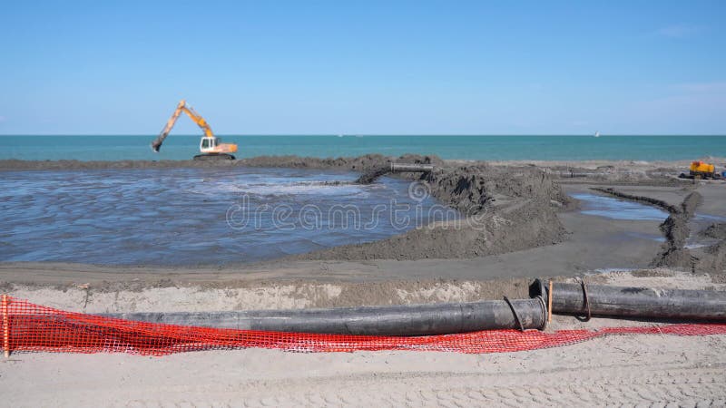 Work in Progress on the Beach To Move the Sand with Pressure Pipes ...