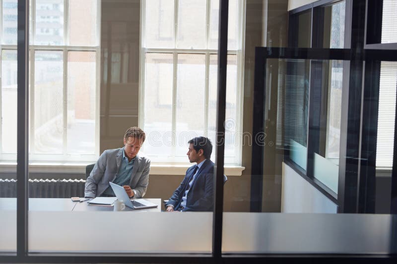 Work in Progress. Businessmen Working in Their Office. Stock Photo ...