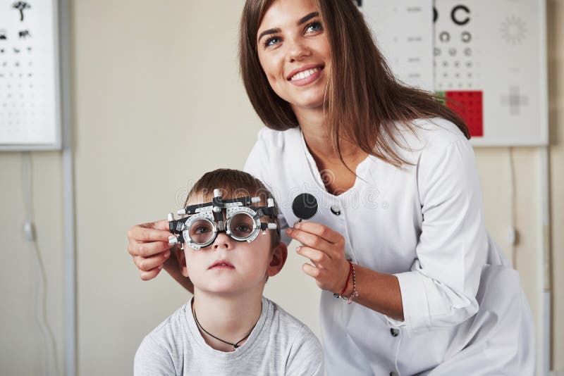 Work is in Progress. Doctor Tuning the Phoropter To To Determine Visual ...