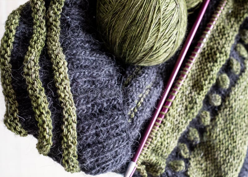 Wool Sweater in the Process of Being Knitted. Photo Shows Textured ...