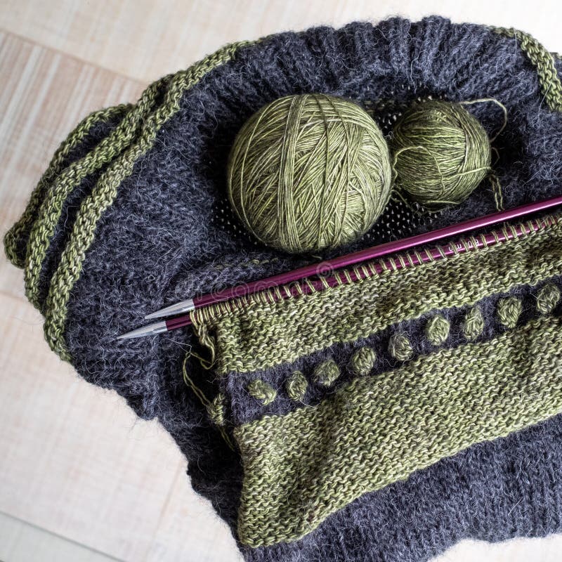 Wool Sweater in the Process of Being Knitted. Photo Shows Textured ...