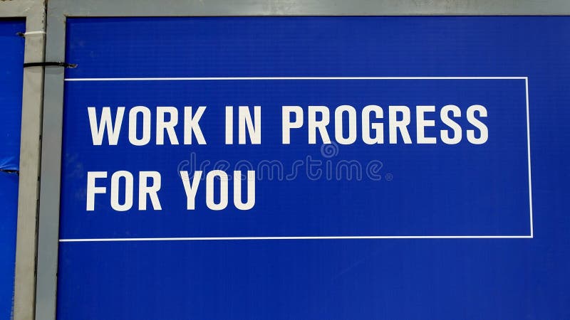 Work in Progress Message on a Blue Panel on Metal Structure. Stock ...
