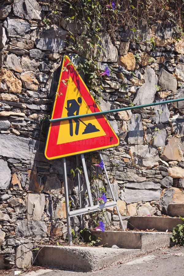 Work in Progress Sign on the Edge of the Road. Triangular Orange, Red ...