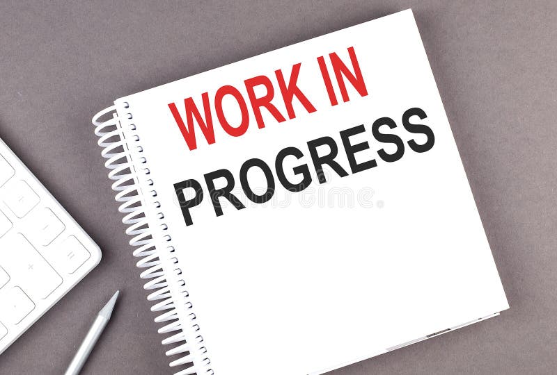 WORK in PROGRESS Text on the Notebook with Calculator and Pen Stock ... WORK in PROGRESS Text on the Notebook with Calculator and Pen Stock ...