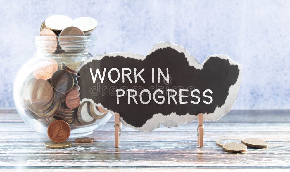 Work in Progress Text on White Notepad Page and White Keyboard and ...