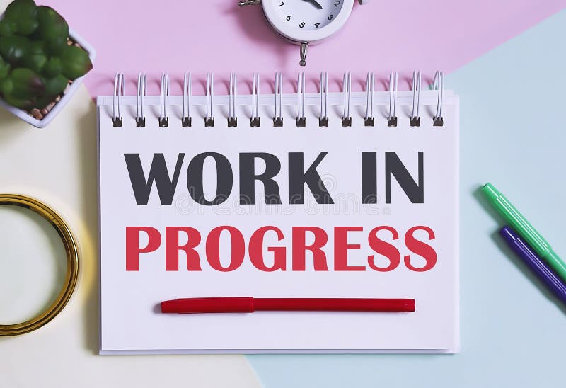 Work in Progress Text Written on a Notebook on Laptop Stock Photo ...