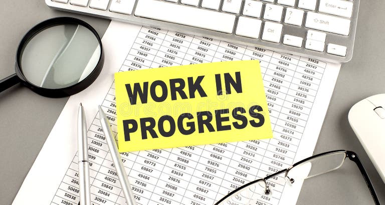 WORK in PROGRESS Text Written on a Sticky on Chart with Keyboard and ...