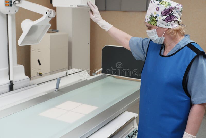 The Work of a Radiologist in the X-ray Room for Diagnostics. Stock ...