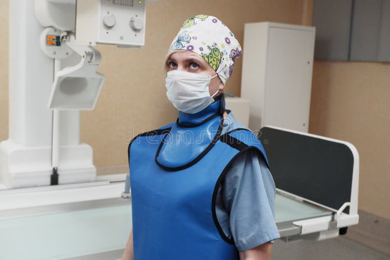 The Work of a Radiologist in the X-ray Room for Diagnostics. Stock ...