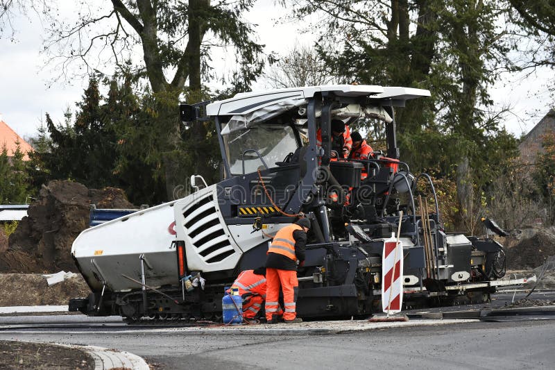 Road Asphalt Paving Machine on the Road Editorial Photography - Image ...