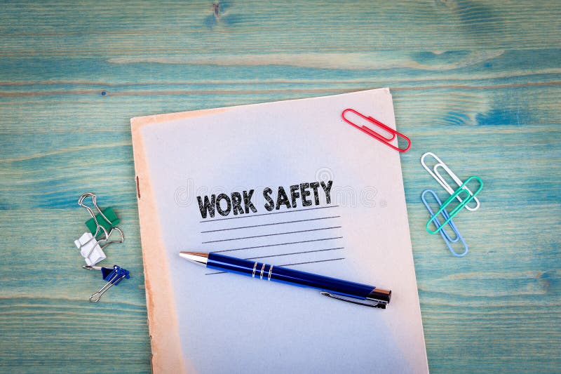 Work Safety Concept. Notebook on a Bright Green Background Stock Photo ...