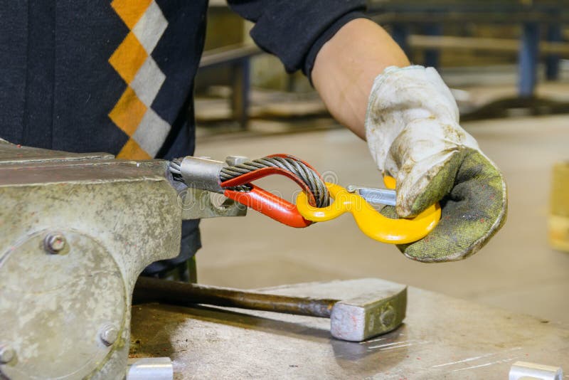 Work Sets the Load Hook into the Loop of the Steel Sling. Stock Photo ...