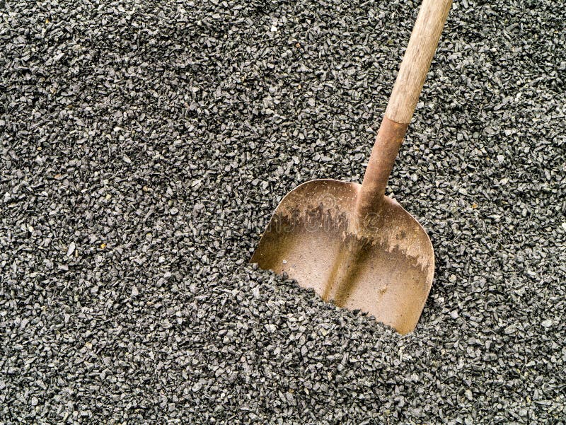 Work - Shovel in a Pile of Crushed Stone Stock Image - Image of shovel ...