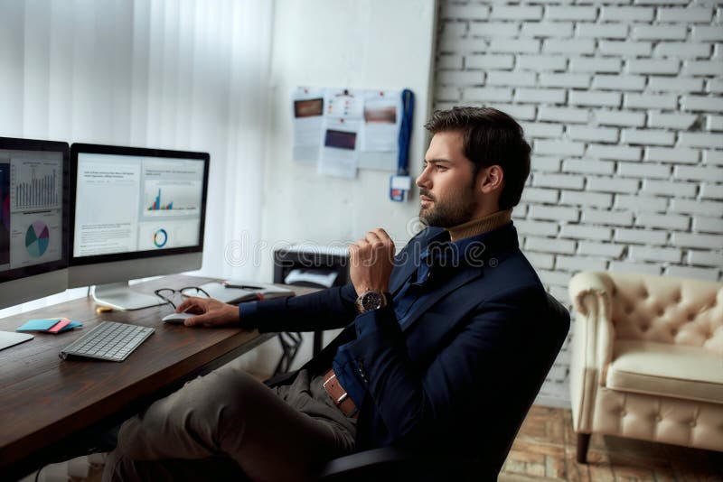 Side View of Young Successful Businessman or Sales Manager Analyzing ...